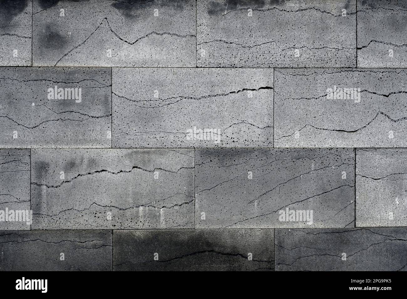 Wall surface with polished grey volcanic basalt stone slabs veneer ...