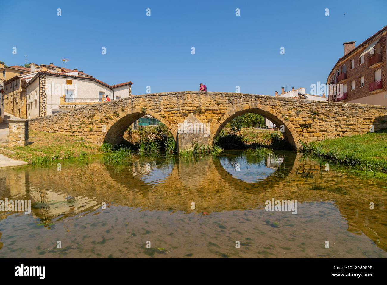 Navarre, Spain, 26 August, 2022: Pilgrims walking over the medieval ...