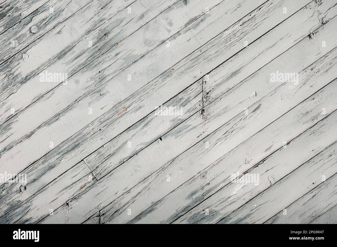 Old white painted wooden wall with diagonal strips, rustic background ...