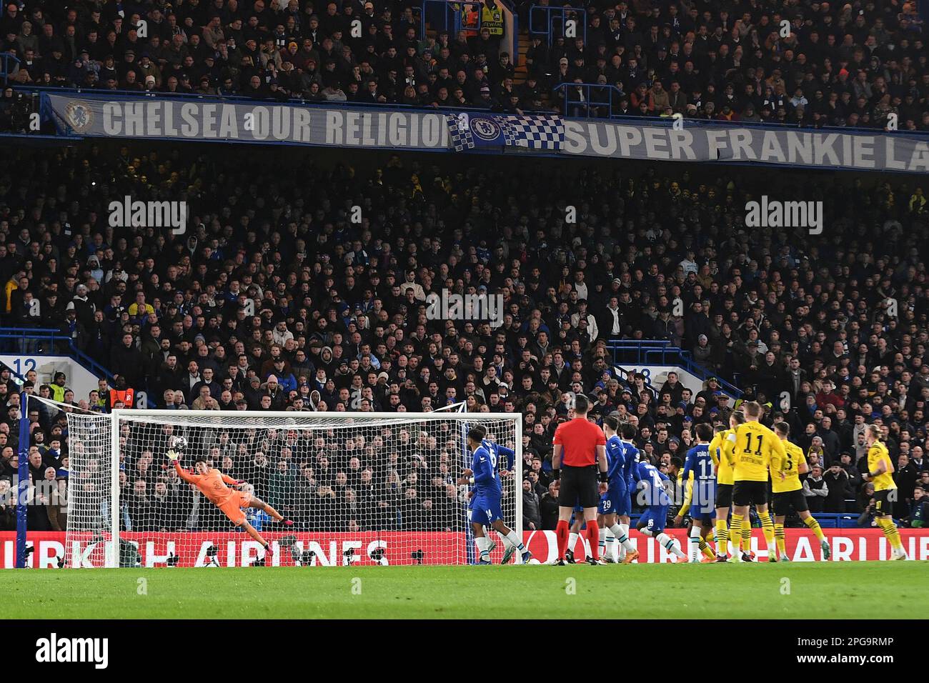 Kepa Arrizabalaga of Chelsea saves a free kick by Marco Reus of ...