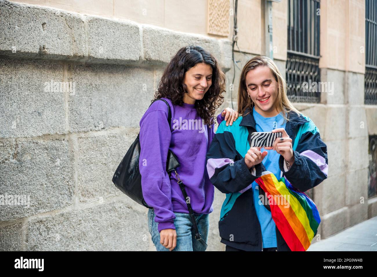 Two diverse male friends walking hi-res stock photography and images ...