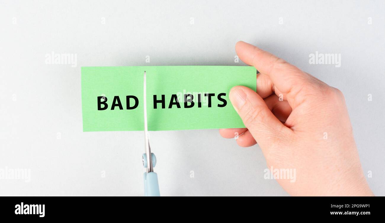 Bad habits sign cut with scissors, break a habit, stop smoking, quit ...