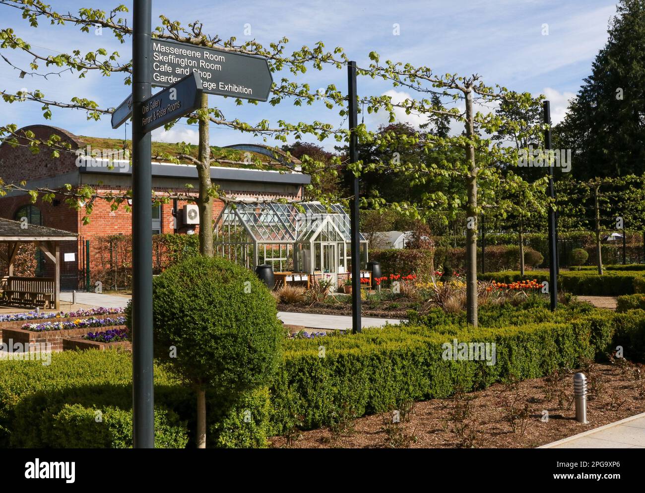 Council community garden, flowerbeds and relaxation area on sunny May ...