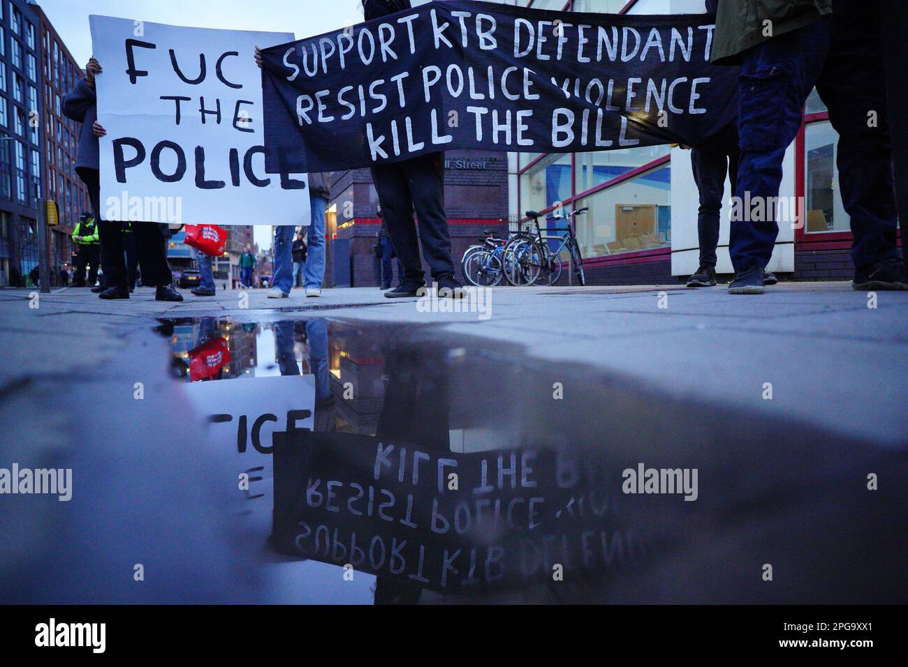 PLEASE NOTE: BANNER PROFANITY People take part in a demonstration to ...