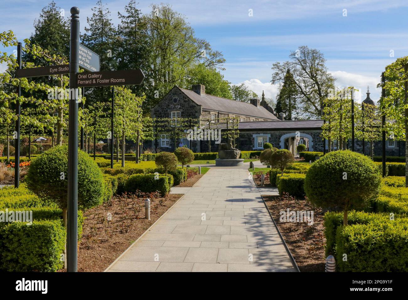 Council community garden, flowerbeds and relaxation area on sunny May ...