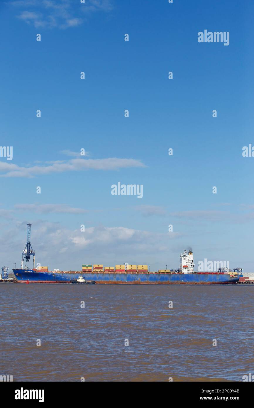 Container ship MSC Mirella entering the Port of Felixstowe assisted by ...