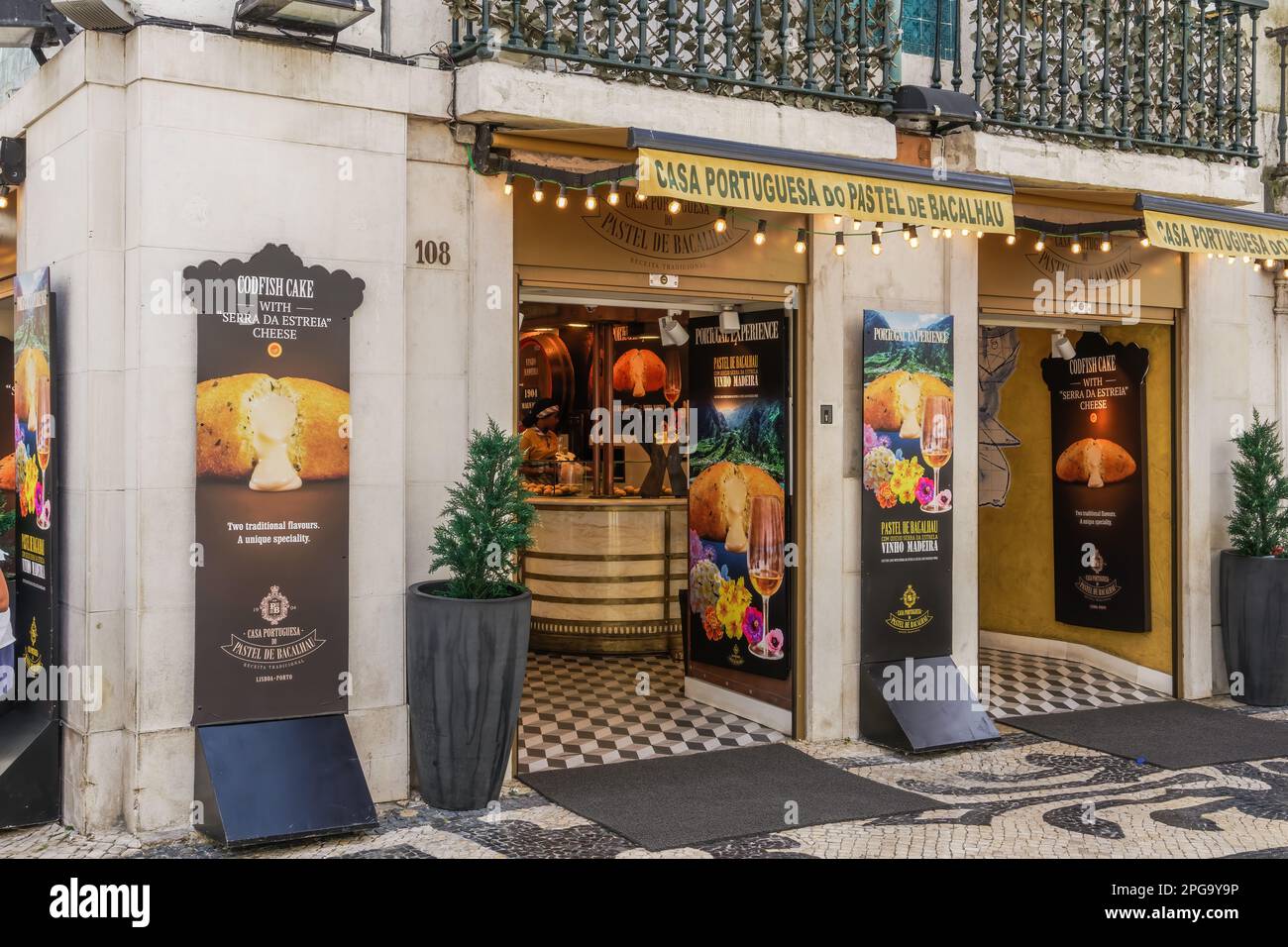 Lisbon, Portugal traditional codfish cake with cheese store exterior ...