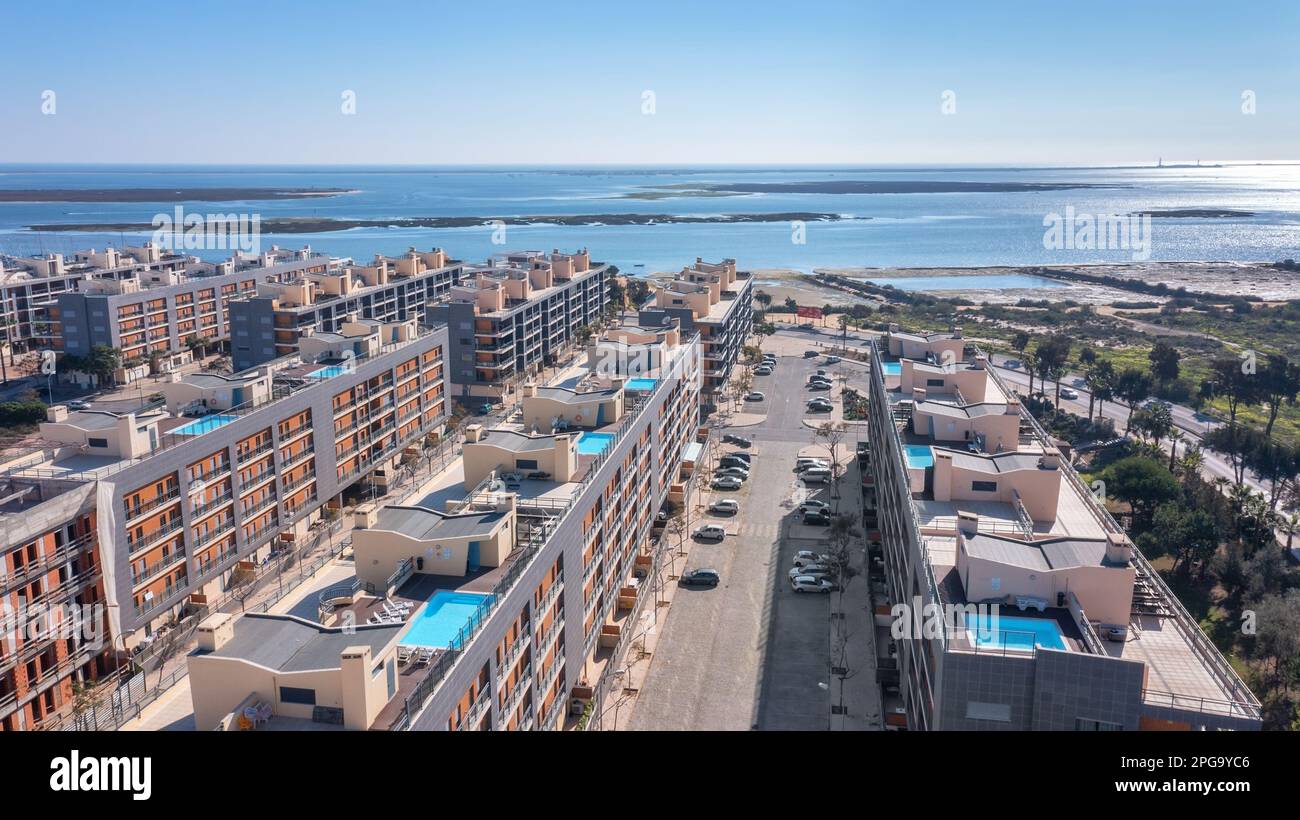 Aerial view of the Portuguese fishing tourist town of Olhao overlooking ...
