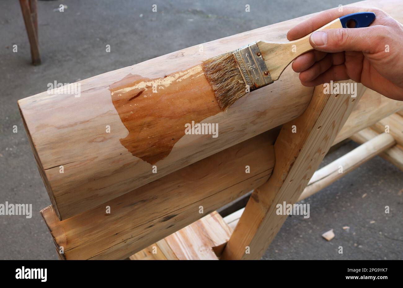 Painter applying wooden clear varnish hi-res stock photography and ...