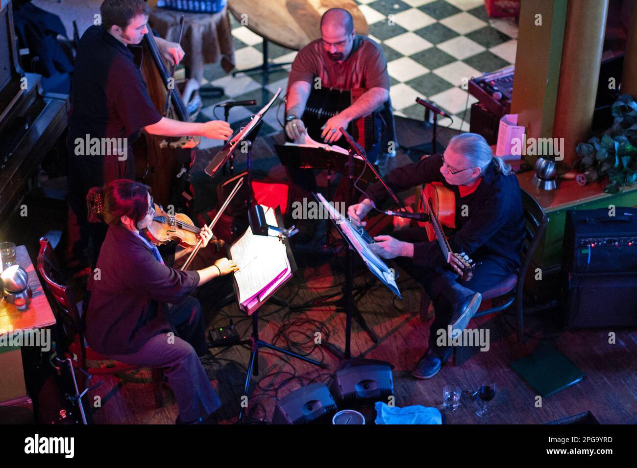 A group of musicians prepares for a performance at a nightspot Stock ...