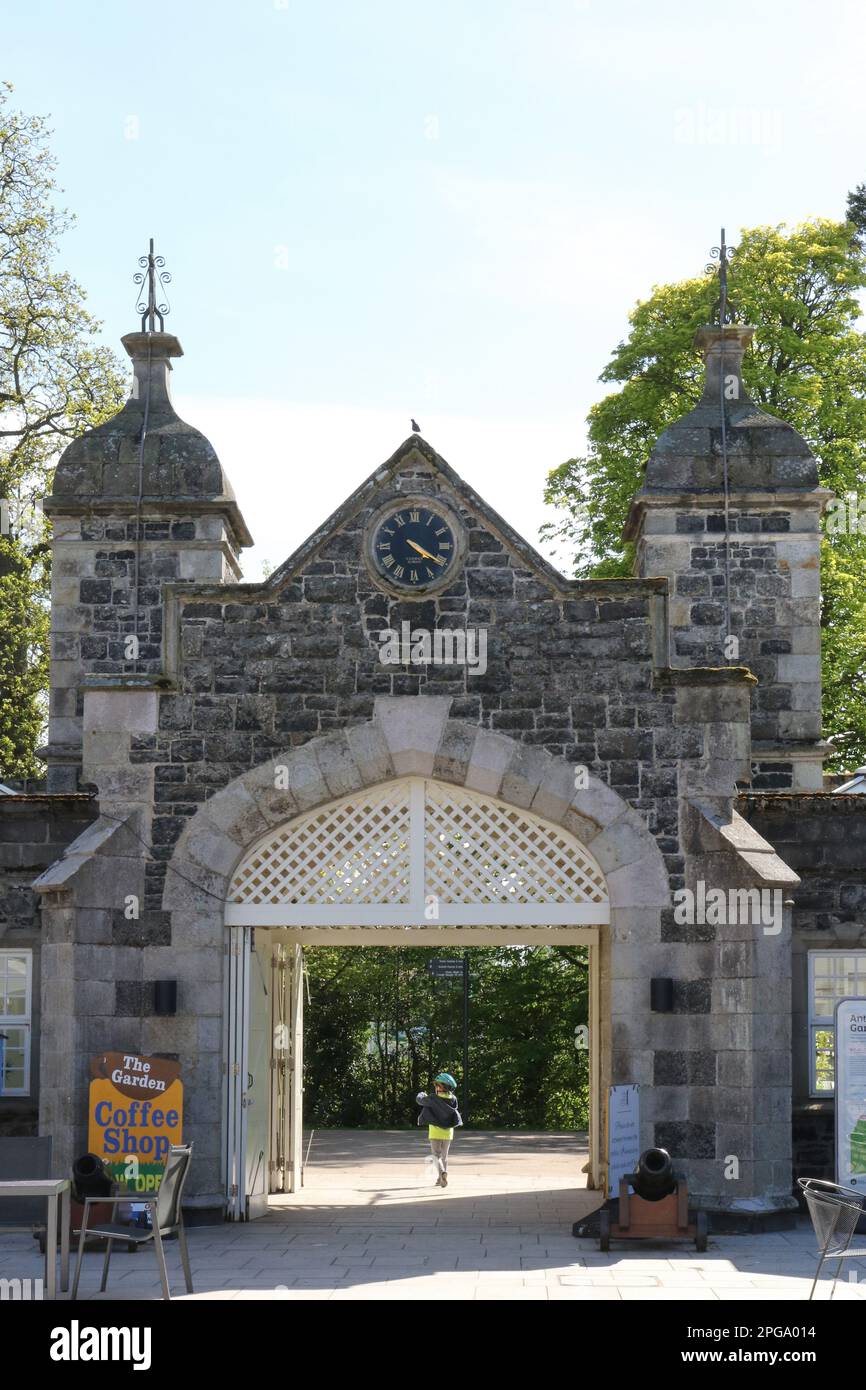 Wall clock above gate and between twin towers of Clotworthy House ...
