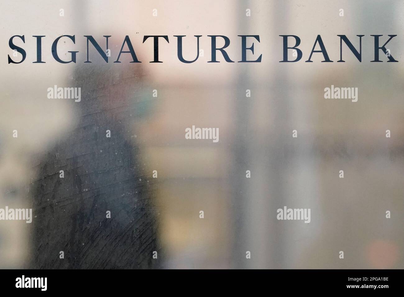 FILE - A sign is displayed at a branch of Signature Bank in New York ...