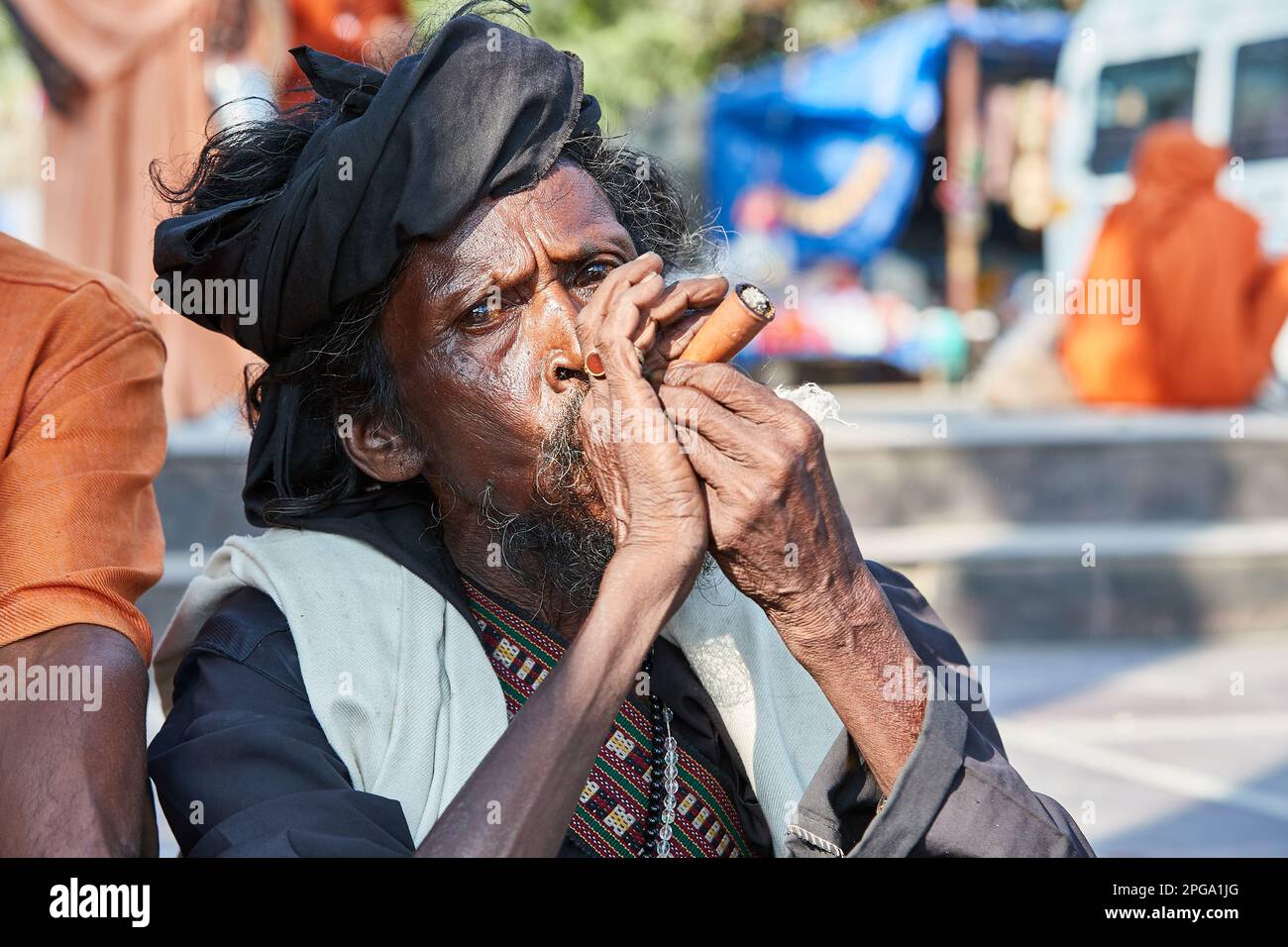 Haridwar, India - portrait of a Sadhu smoking marihuana in a chillum ...