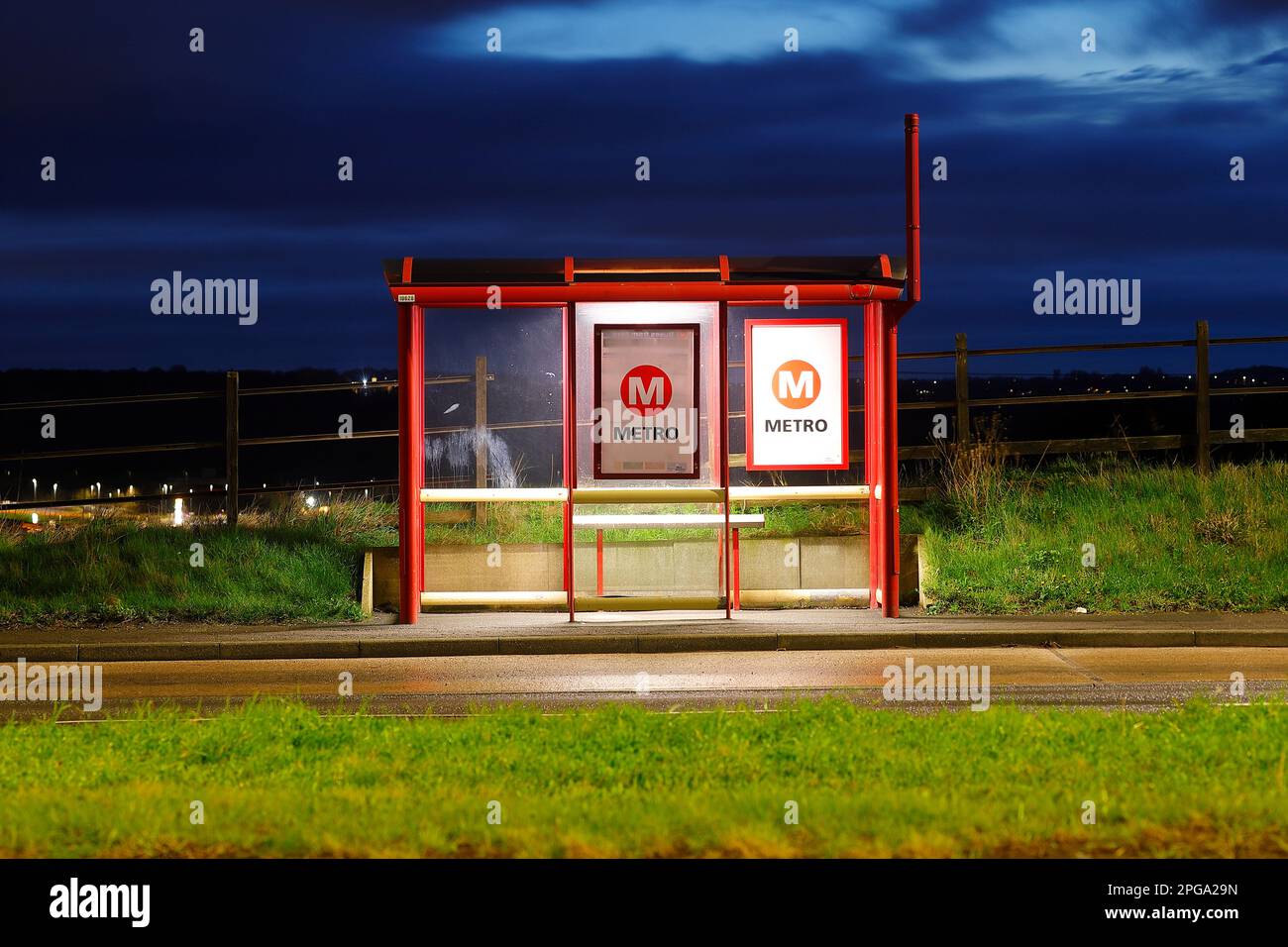 An empty Metro bus shelter at night on Leeds Road in Rothwell, Leeds ...