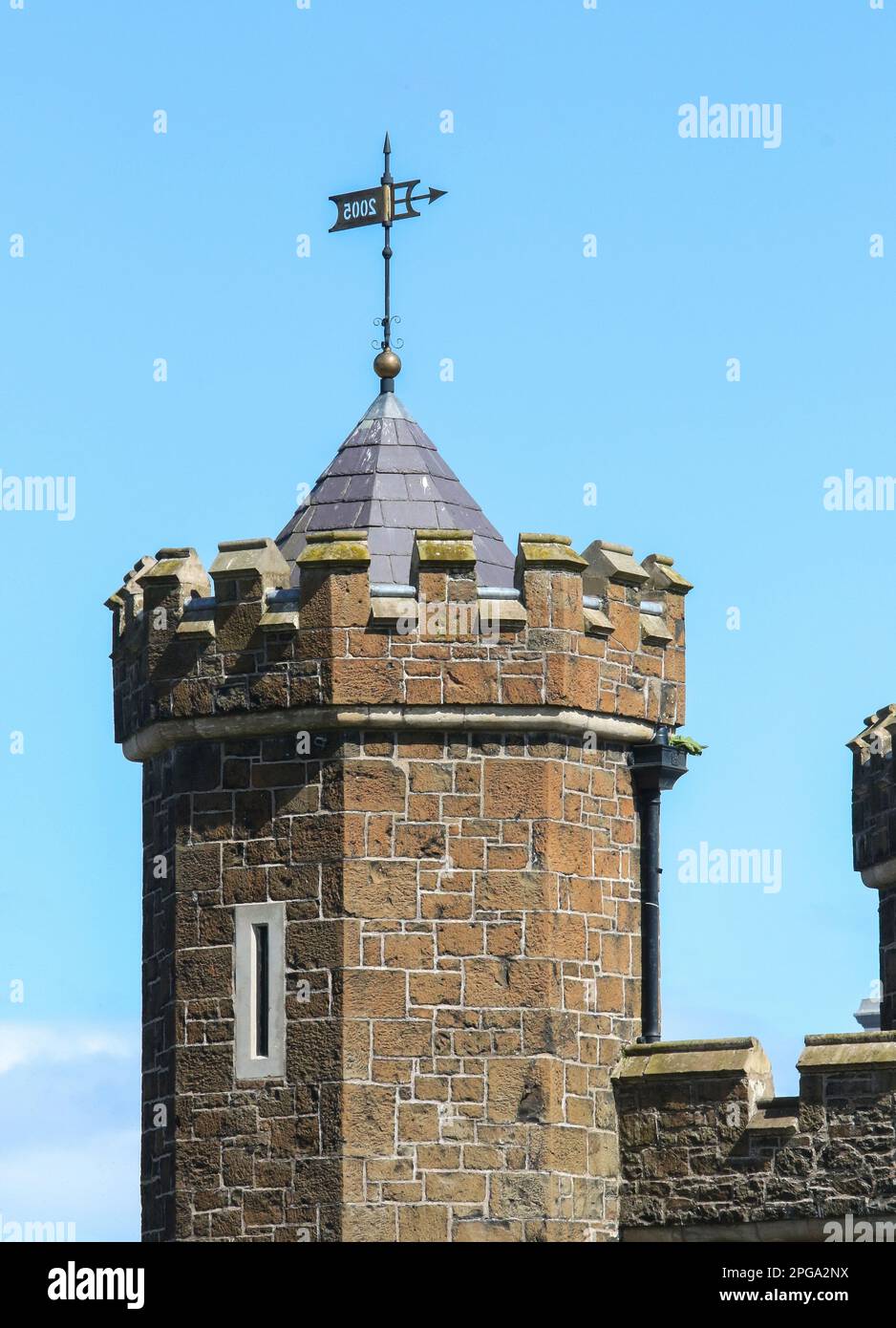 Weather vane on turret of Barbican Gate Lodge an old heritage building ...