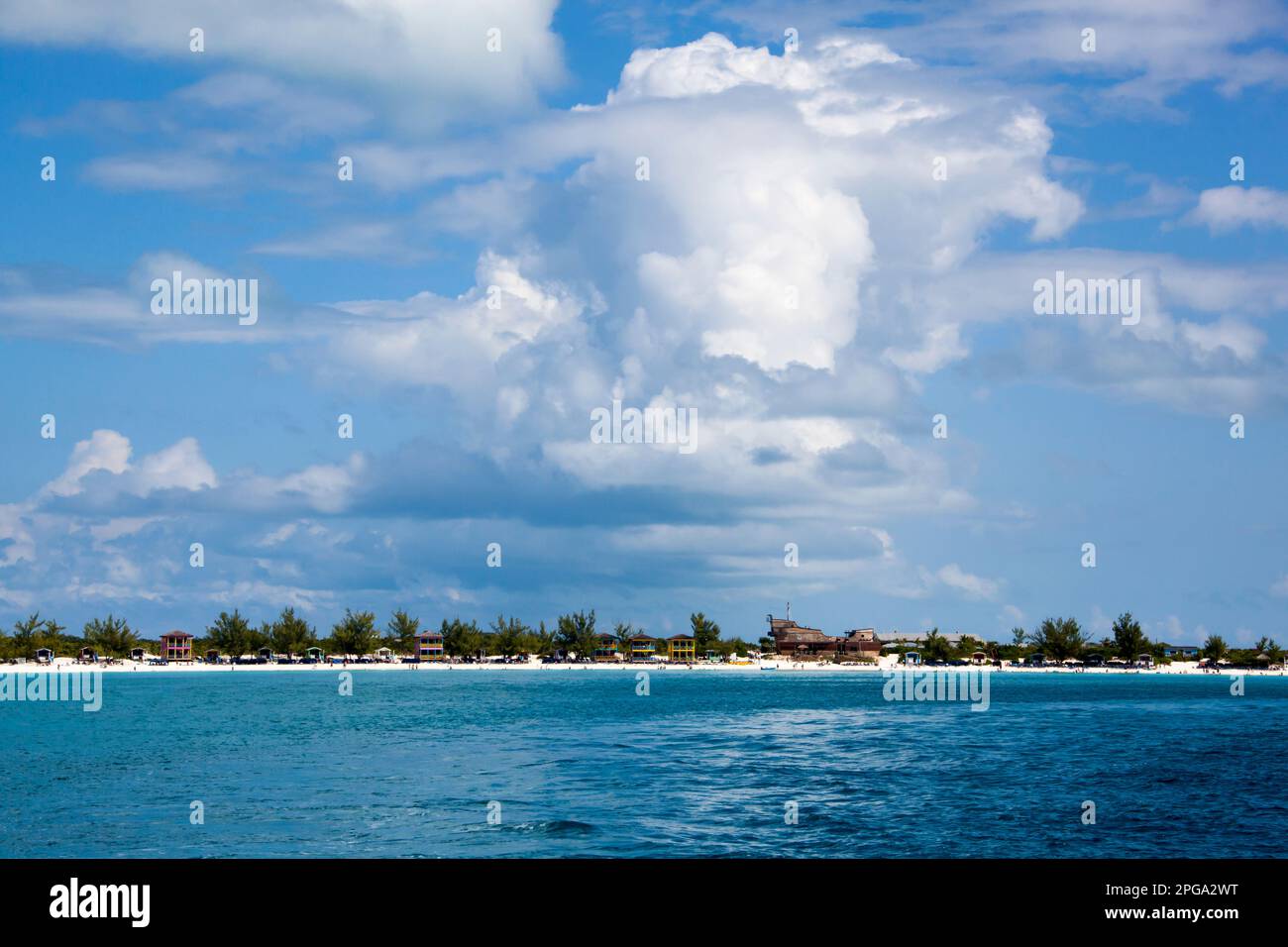 The scenic view of a cloudy picturesque sky over Half Moon Cay island ...