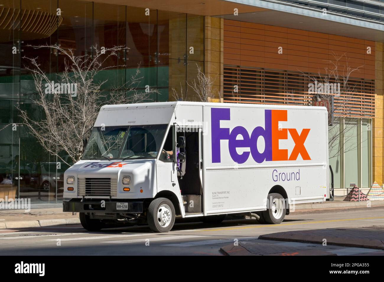 Austin, Texas, USA - February 2023: FedEx truck making a delivery to a ...