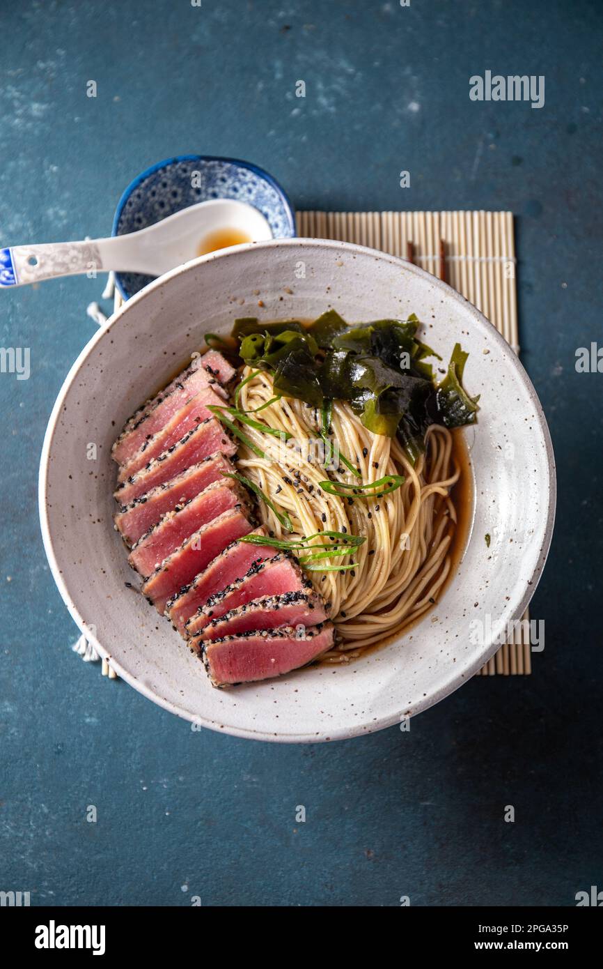 Tuna steak ramen. Japanese soup with noodles ramen, miso, fried tuna ...