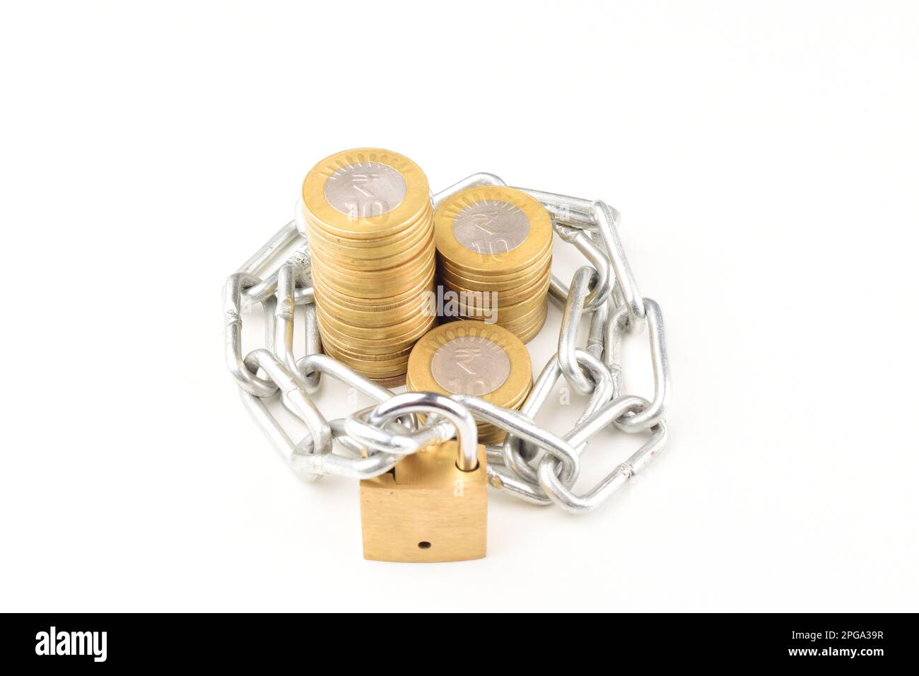 Indian money locked with chain and padlock isolated on white background ...