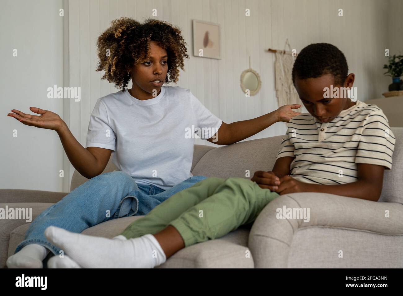 Child scolded by parent hi-res stock photography and images - Alamy