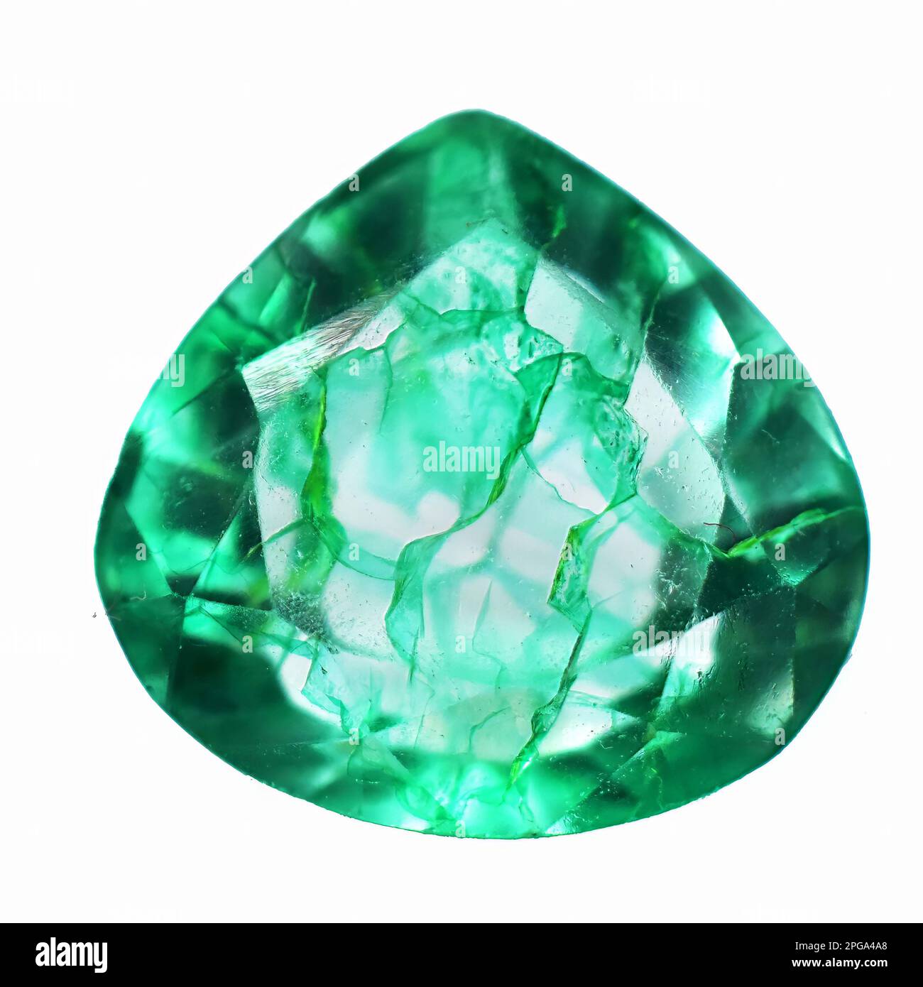 Natural gem green emerald on gray background Stock Photo - Alamy
