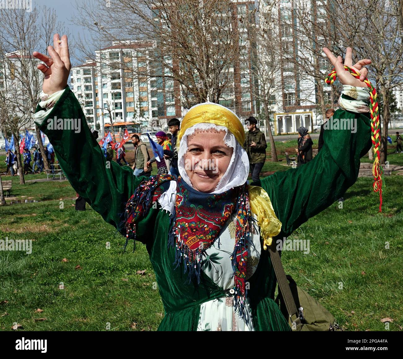 Diyarbakir, Turkey. 21st Mar, 2023. A Kurdish woman is seen in colorful ...