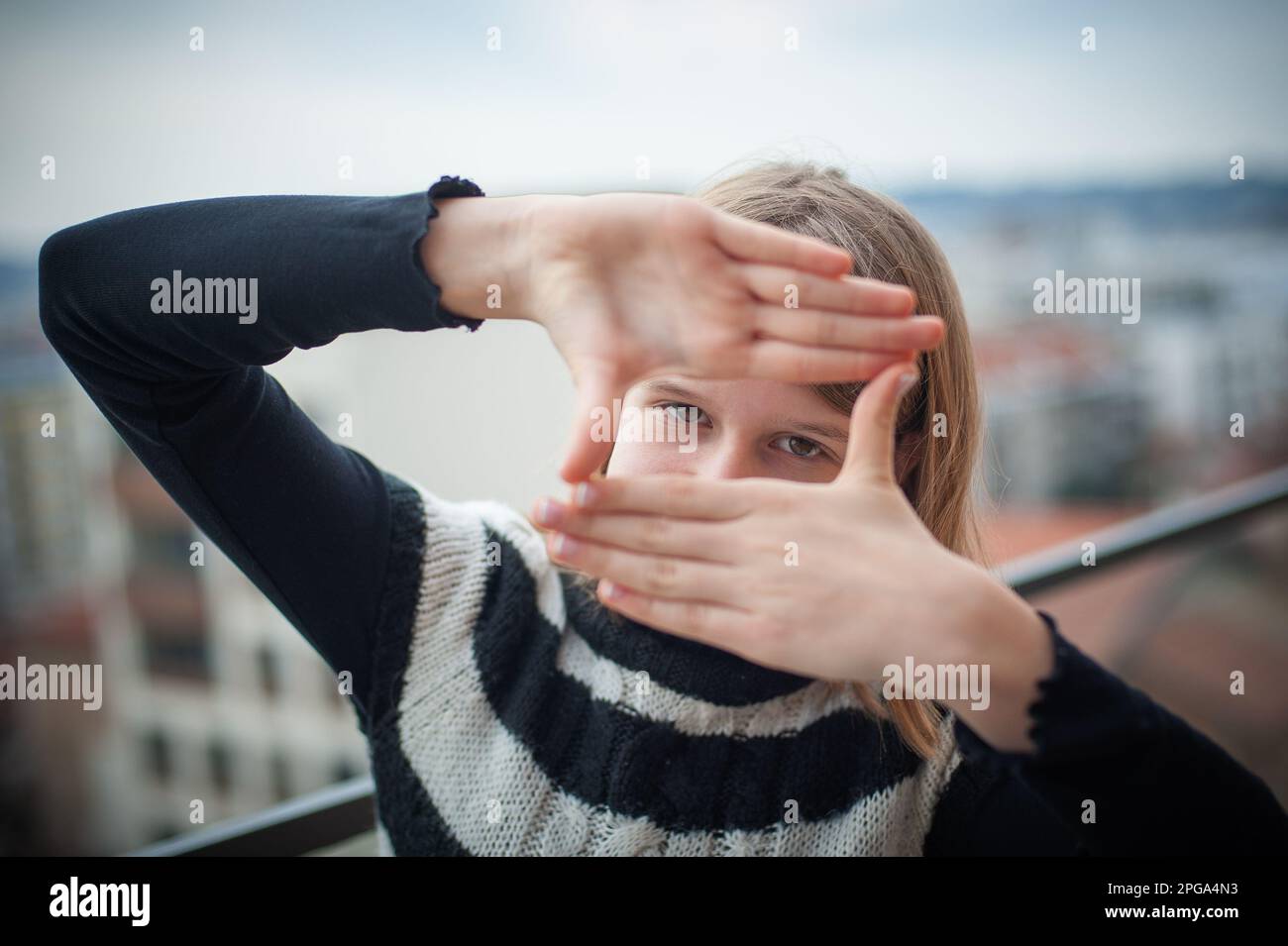 Capture Moments. Young woman in a striped black and white sweater ...