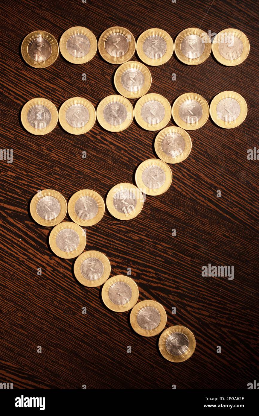 Top view of rupee symbol created by indian rupee coin Stock Photo - Alamy
