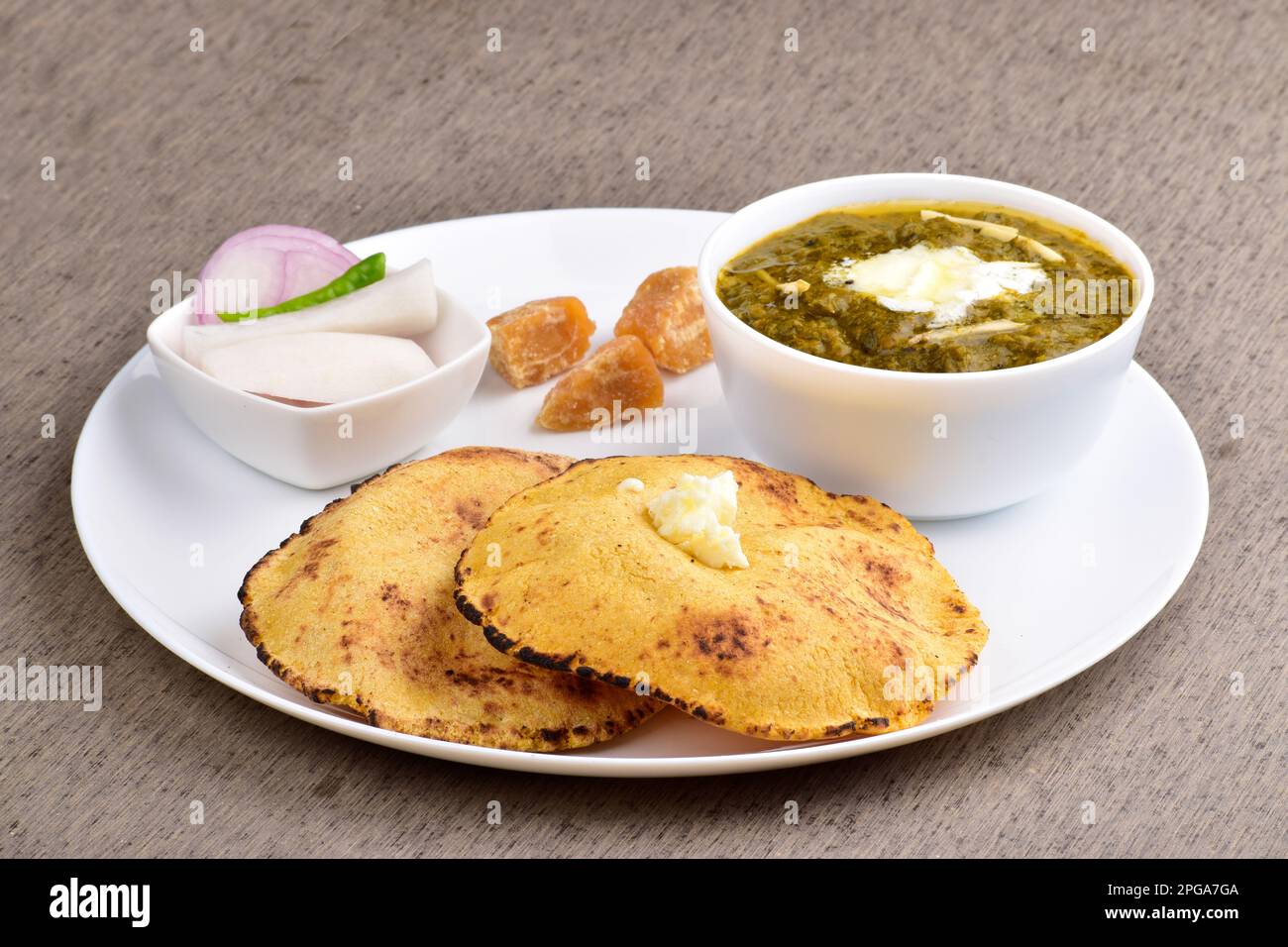 Punjabi meal saag and makki roti with salad in plate Stock Photo - Alamy