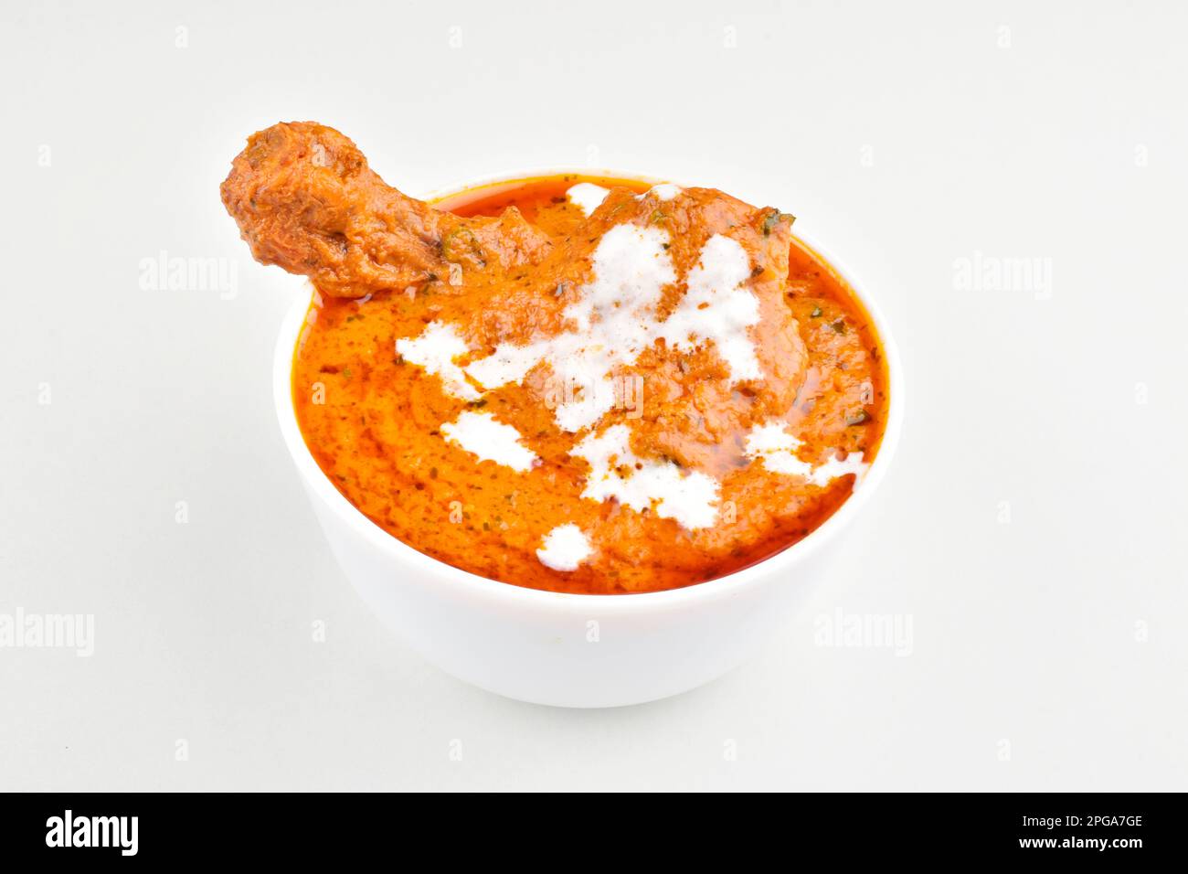 Creamy butter chicken in bowl isolated on white background Stock Photo ...