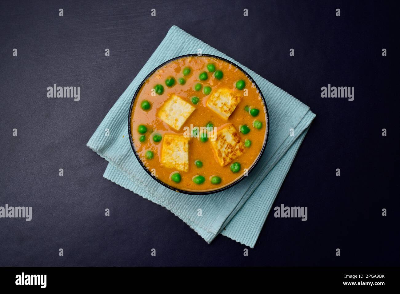Cottage cheese and peas curry top view, matar paneer Stock Photo - Alamy