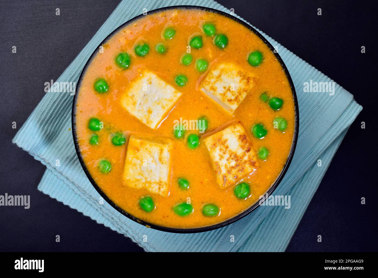 Matar paneer in bowl top view, famous indian dish peas and cottage ...