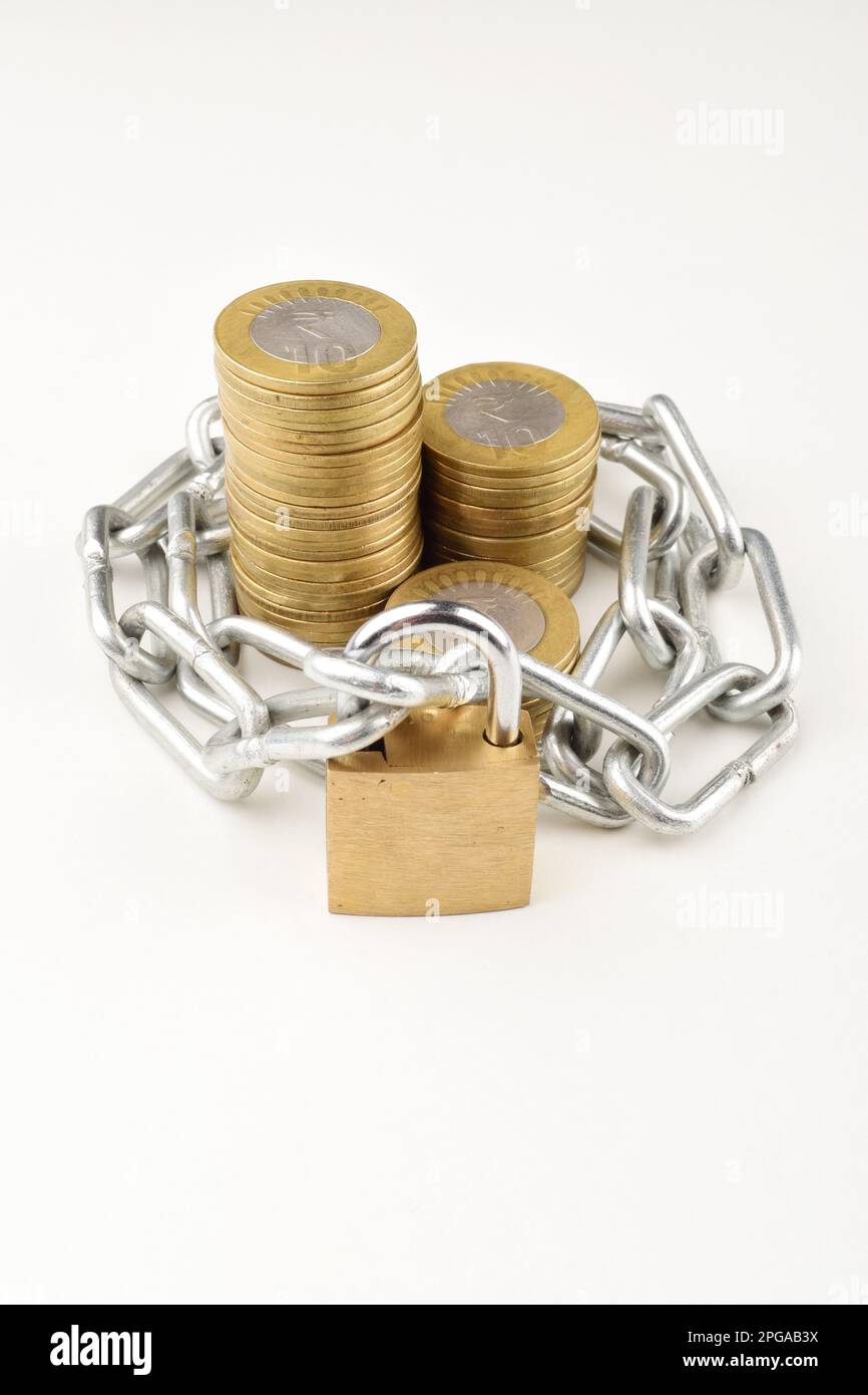 Indian rupee coin with lock isolated on white background, money ...