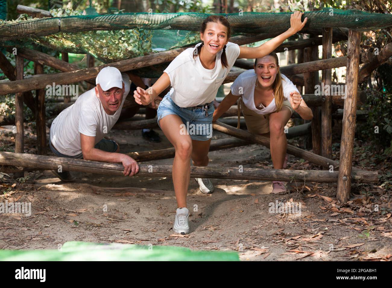 Friends having fun at adventure park Stock Photo - Alamy