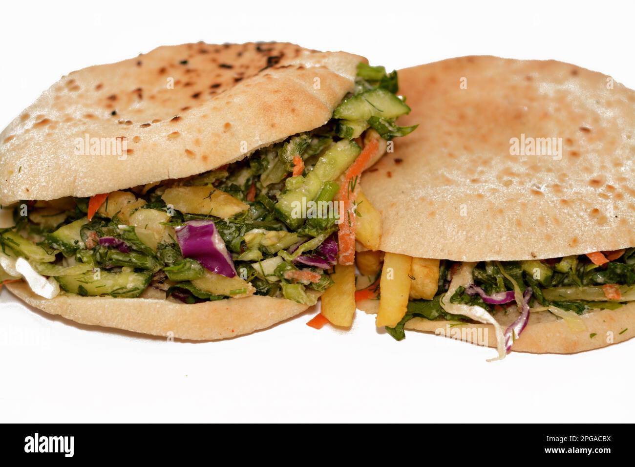 Flat Shami Syrian bread filled with french fries and green salad ...