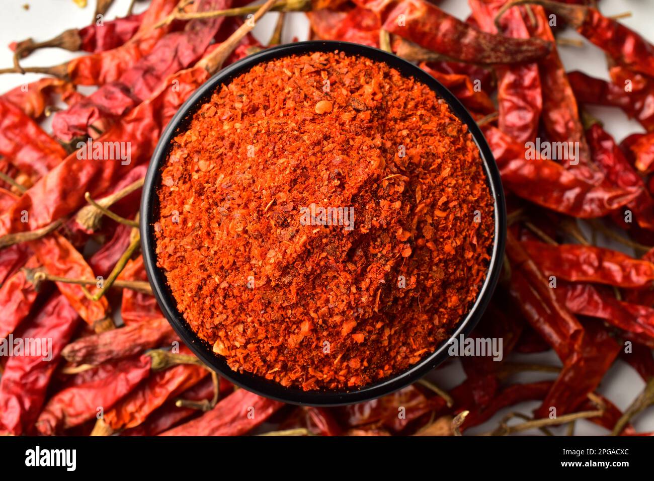Ground red chilly top view Stock Photo - Alamy