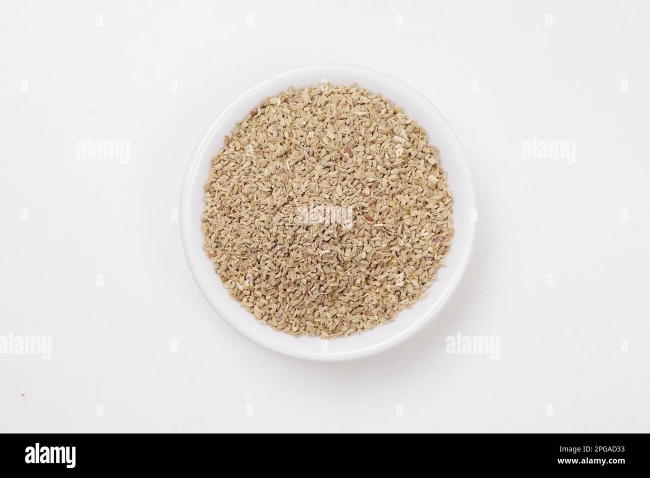 Carom seeds isolated on white background Stock Photo - Alamy