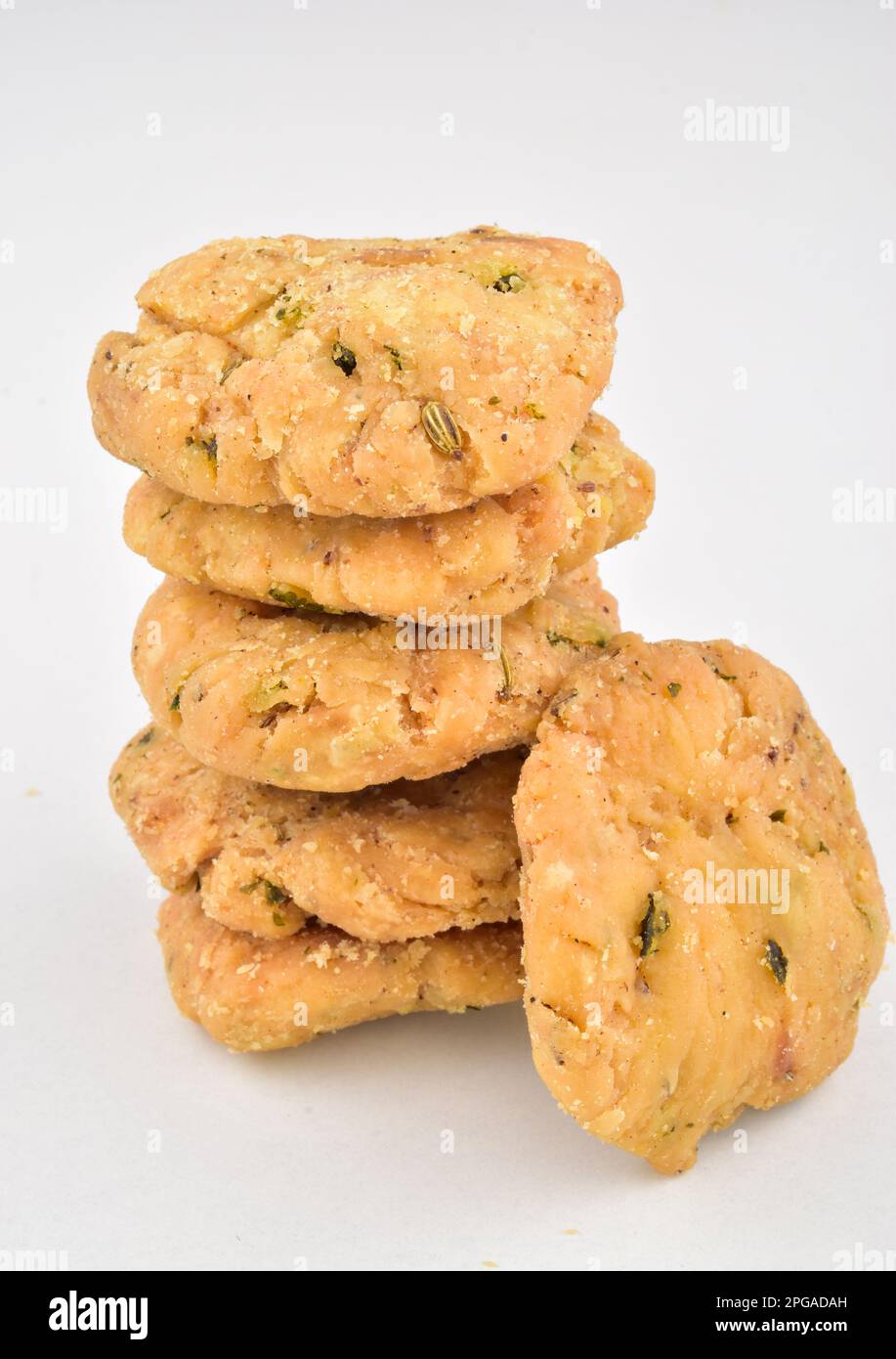 Methi mathri indian snacks isolated on white background Stock Photo - Alamy