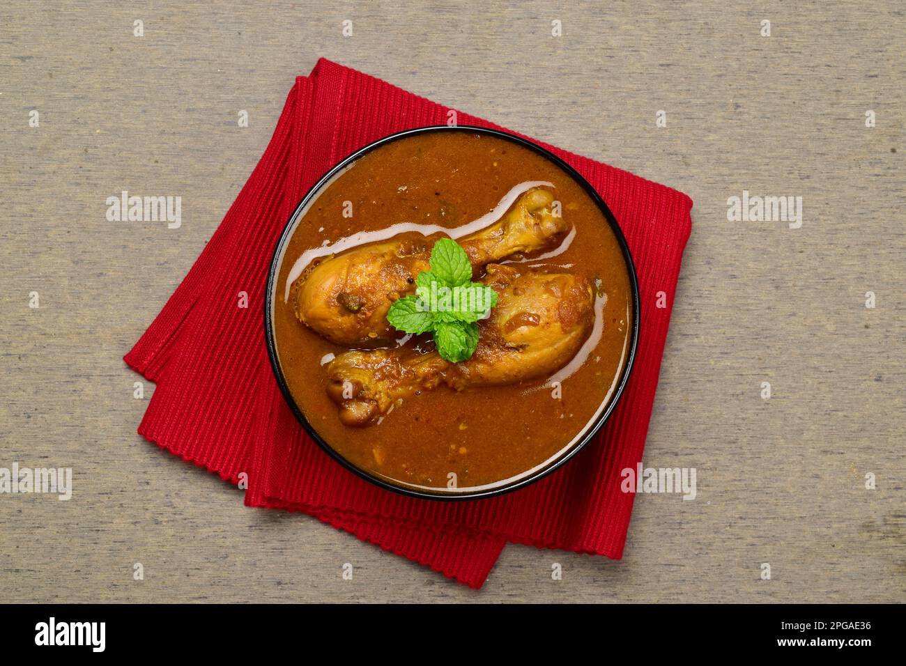 Indian style chicken curry garnished with mint leaves, spicy indian ...