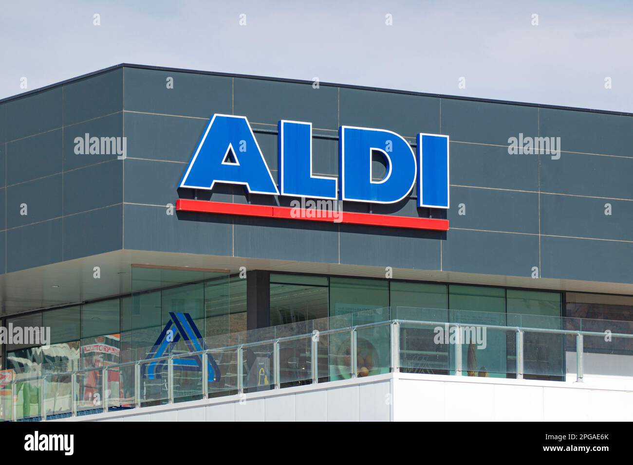 Finestrat, Spain - March 2, 2023: Aldi logo sign on the store wall. Aldi is discount supermarket ...