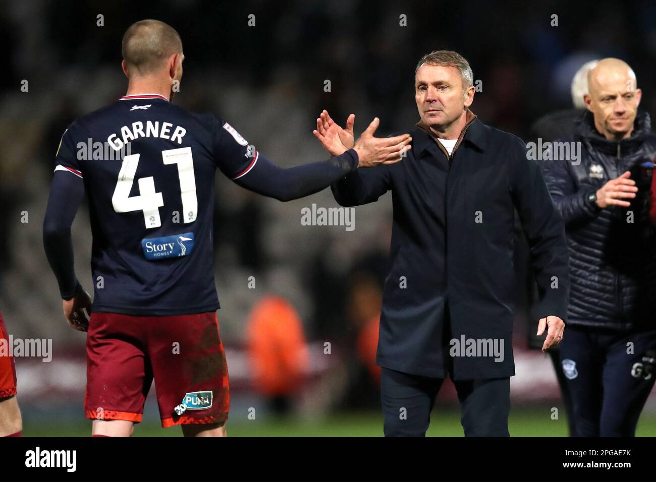 Carlisle United's Joe Garner (left) and manager Paul Simpson shake hands after the final whistle ...
