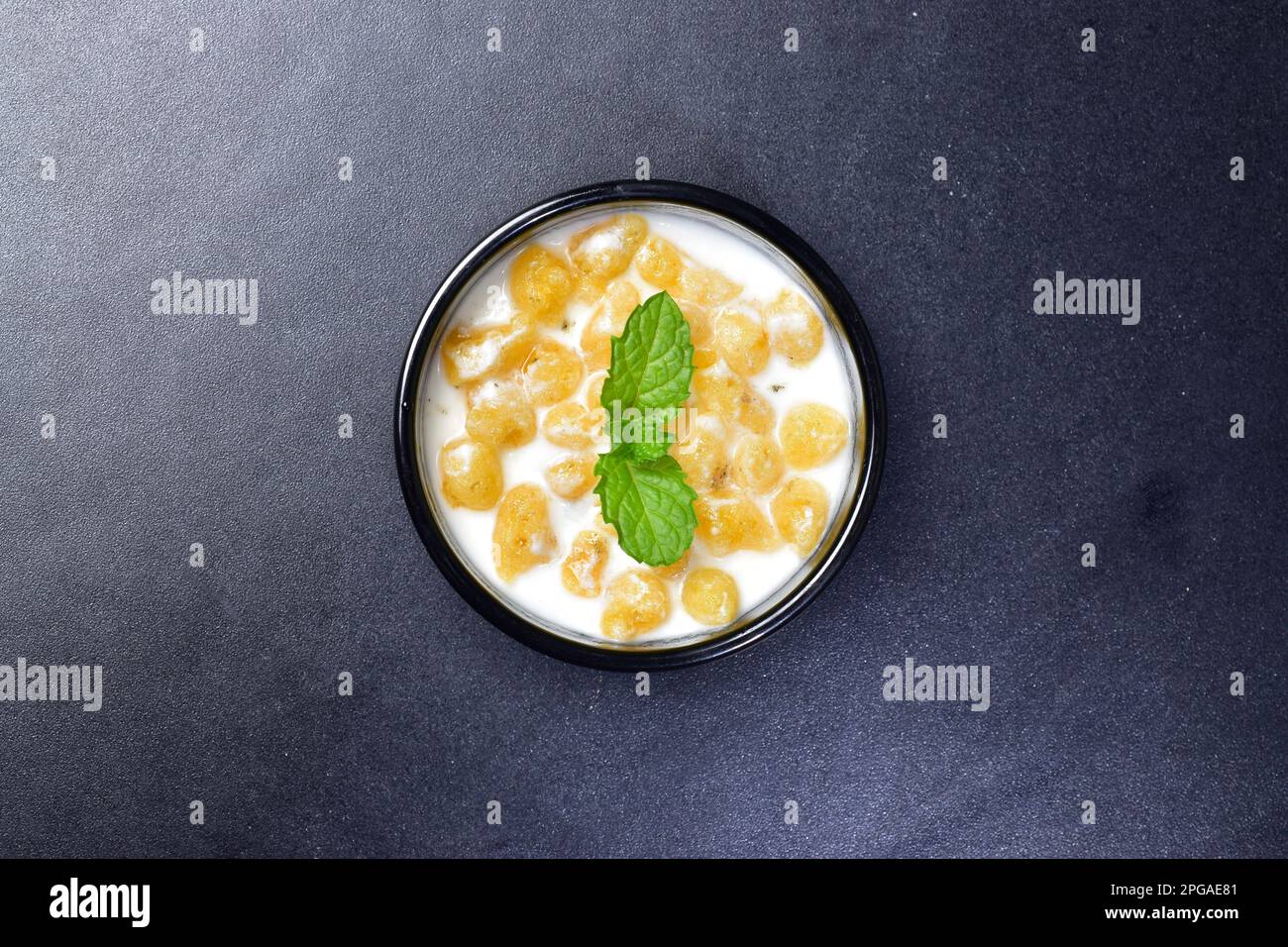 Top view of boondi raita with mint leaves Stock Photo - Alamy