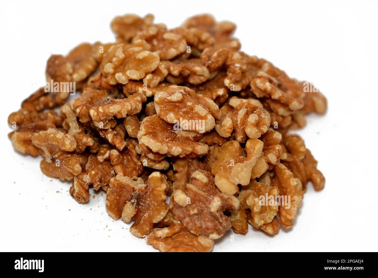 The walnut, an edible seed of any tree of the genus Juglans (family ...
