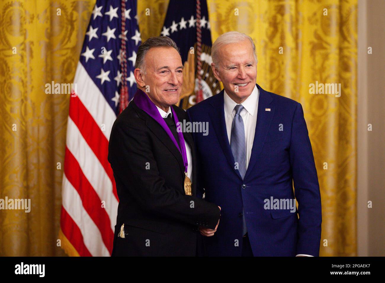 Washington, United States. 21st Mar, 2023. President Joe Biden shakes ...