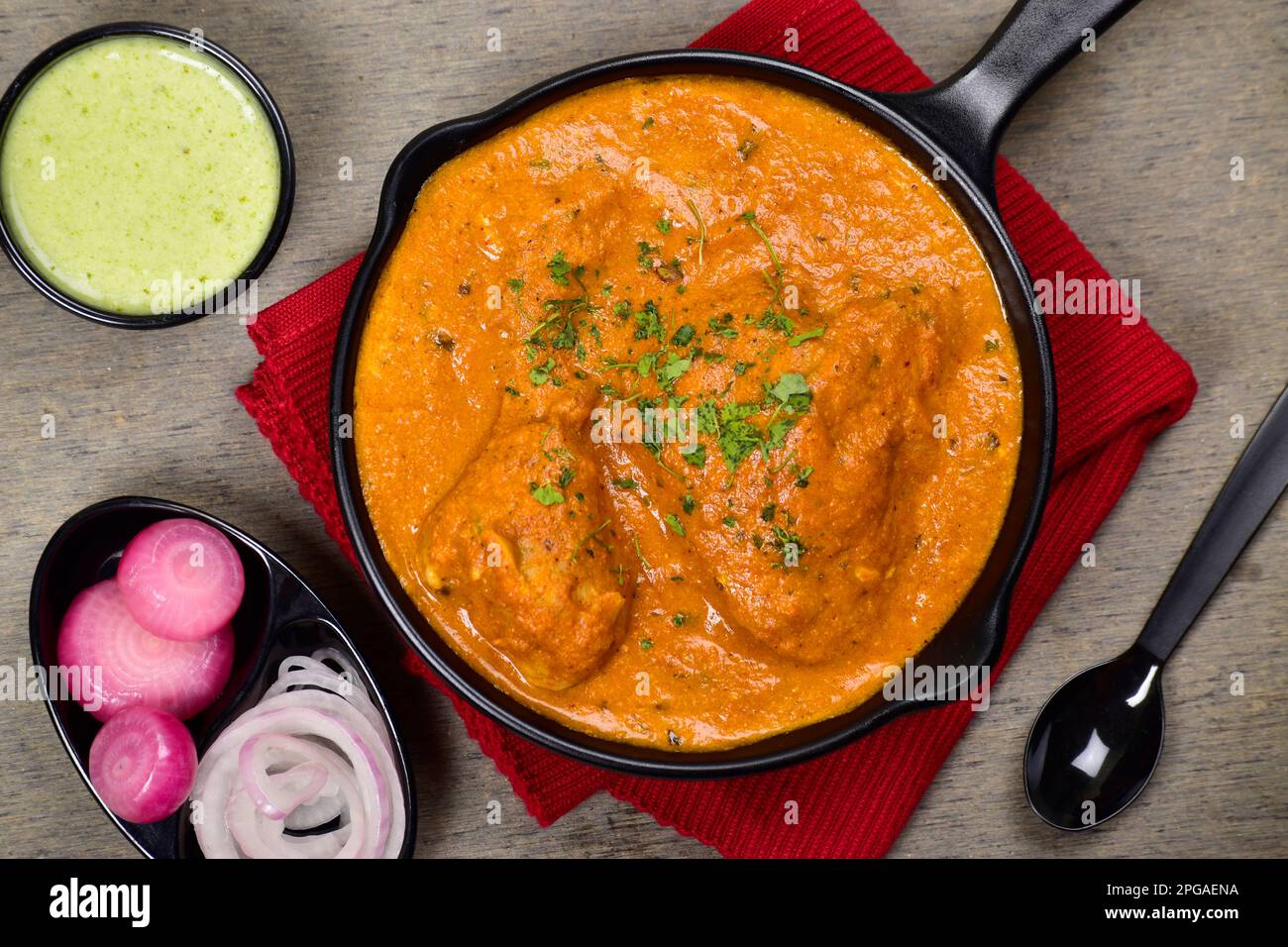 Top view of butter chicken garnished with kasuri methi Stock Photo - Alamy