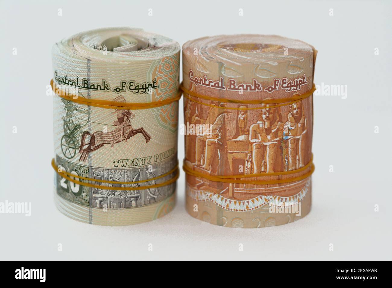 Rolls of 1 EGP LE one Egyptian pound cash money bills and 5 LE five ...