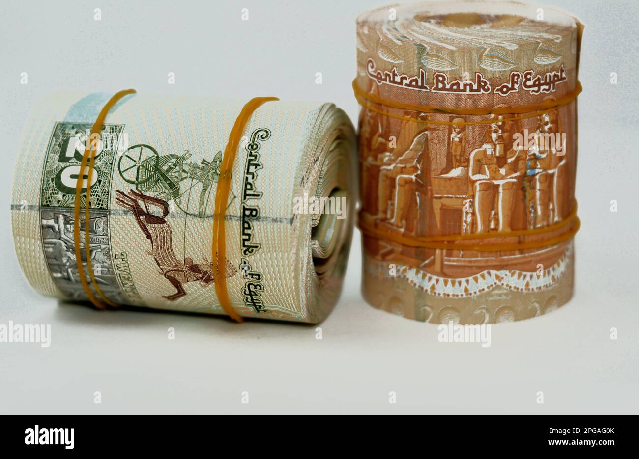 Rolls of 1 EGP LE one Egyptian pound cash money bills and 5 LE five ...