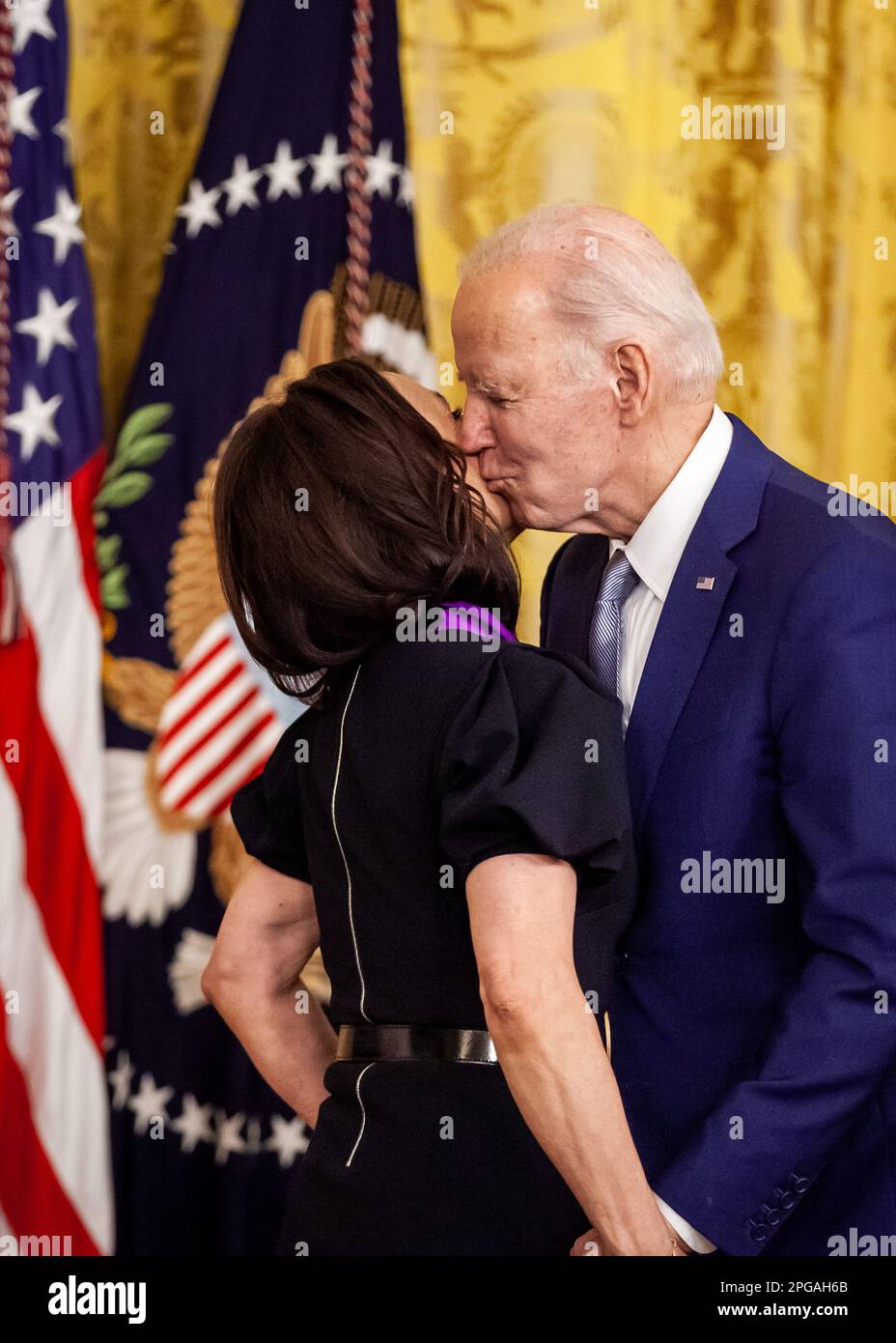 Washington, United States. 21st Mar, 2023. President Joe Biden presents ...