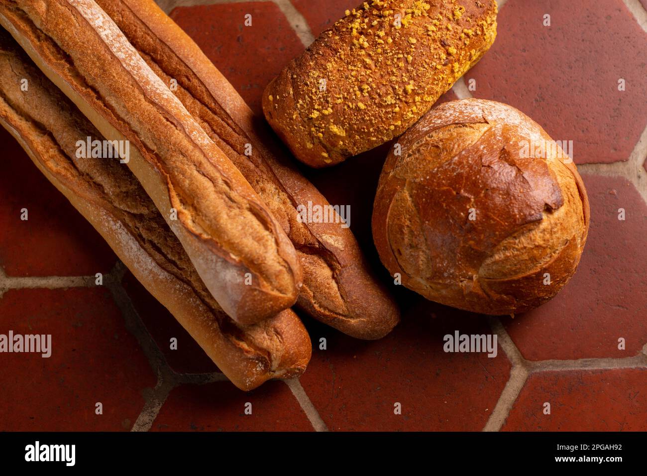 different types of French bread. Baguettes, bread with seeds on the ...