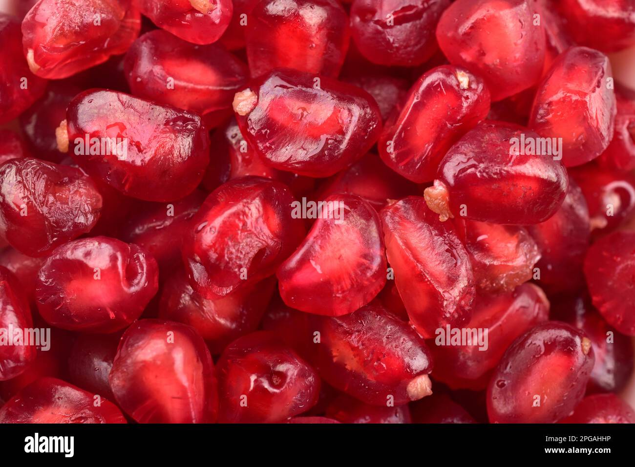 Closeup pomegranate seeds texture background Stock Photo - Alamy